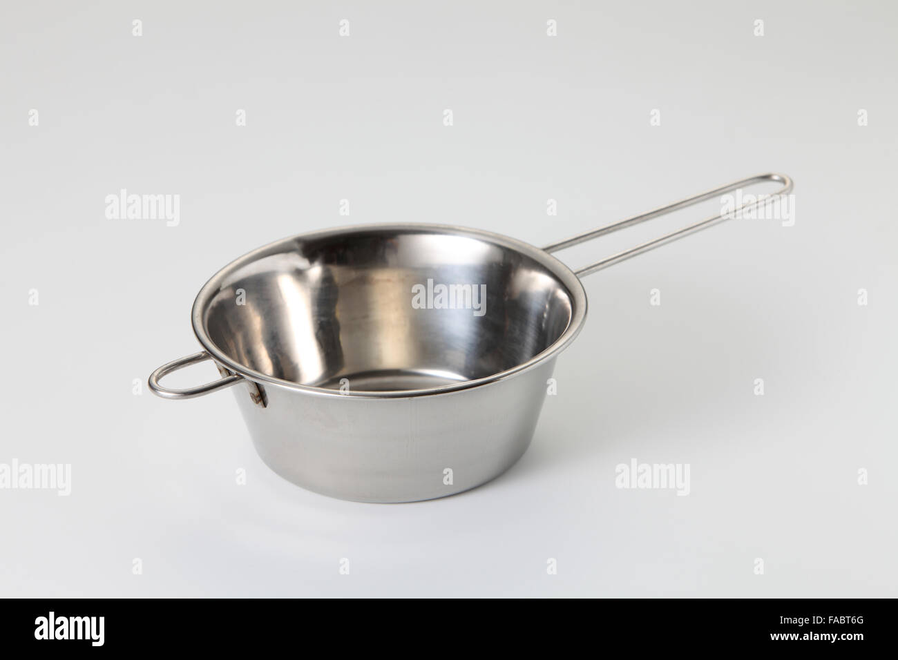stainless steel baking utensil with handle Stock Photo - Alamy
