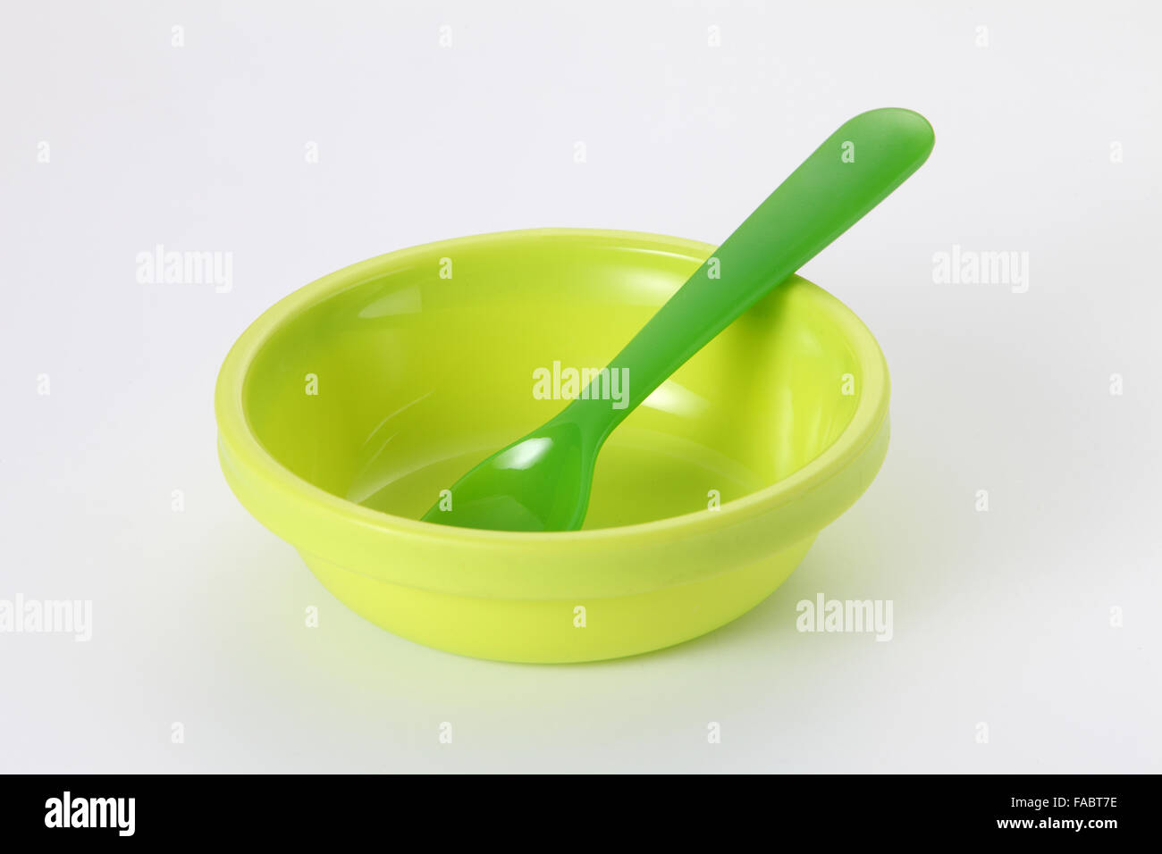 yellow plastic bowl on the white background Stock Photo - Alamy