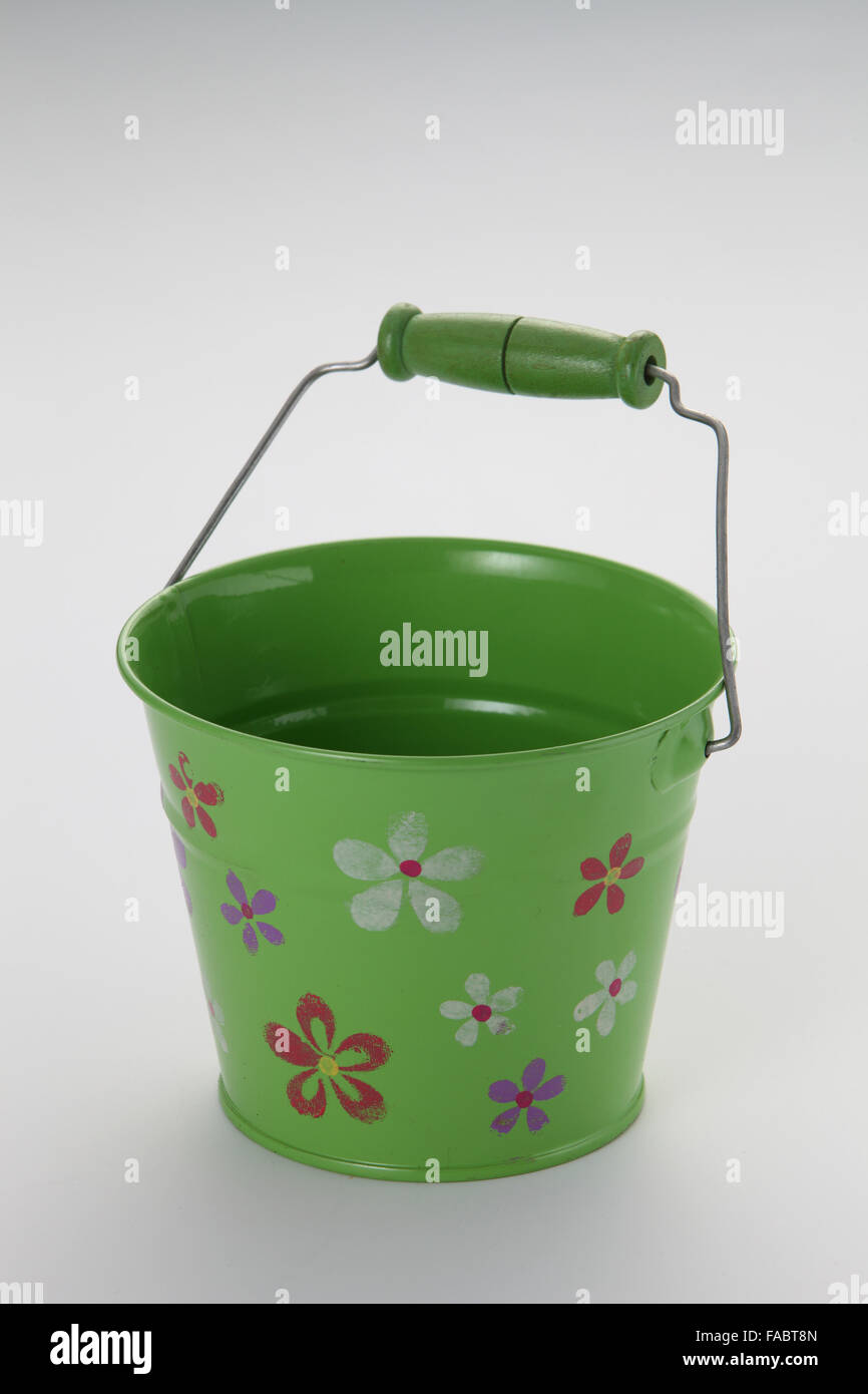green color bucket on the white background Stock Photo - Alamy