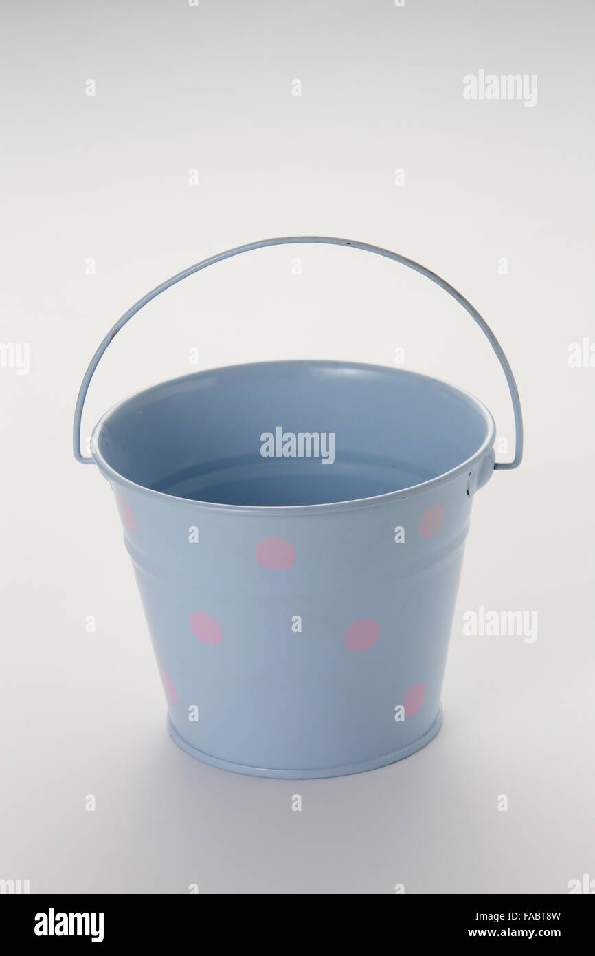 blue color pail on the white background Stock Photo - Alamy
