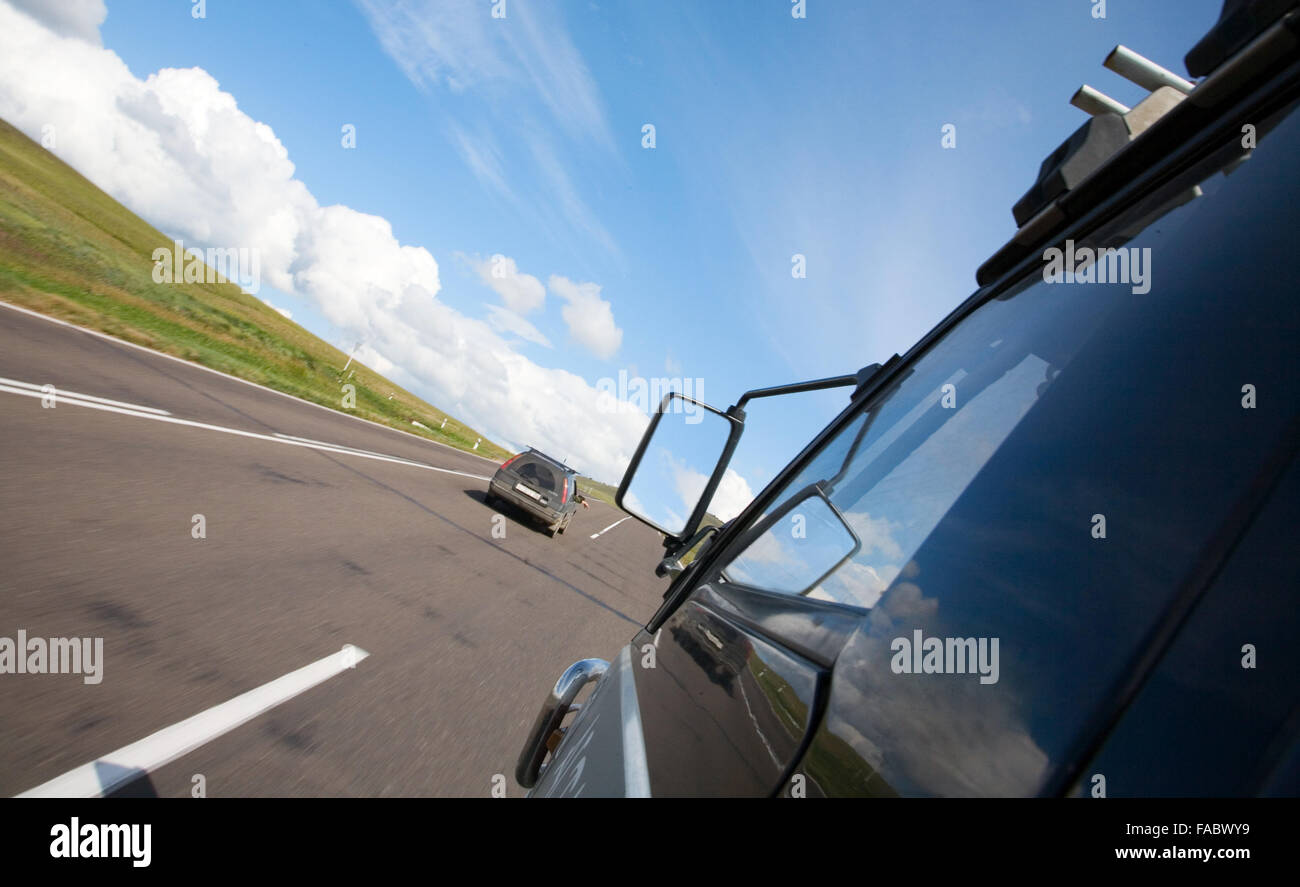 Mirror car moving on highway hi-res stock photography and images - Alamy