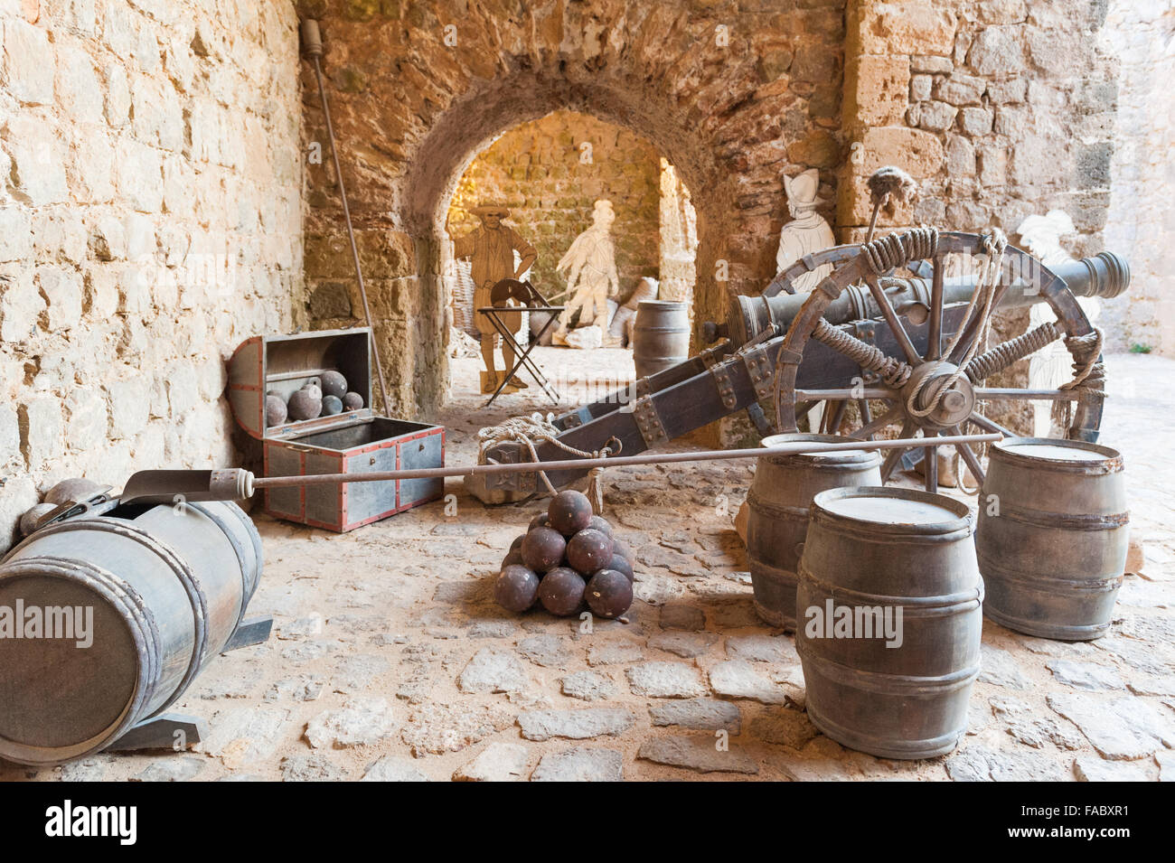 Canon and canon balls at the fort at the port of Ibiza old town Spain ...