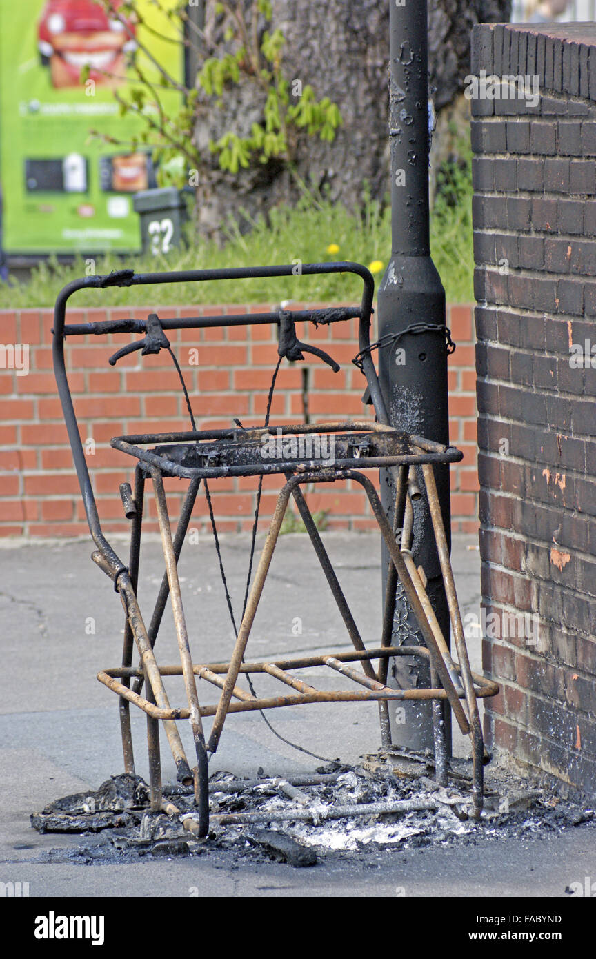 Burnt out postman's delivery trolley set on fire by yobs Stock Photo ...