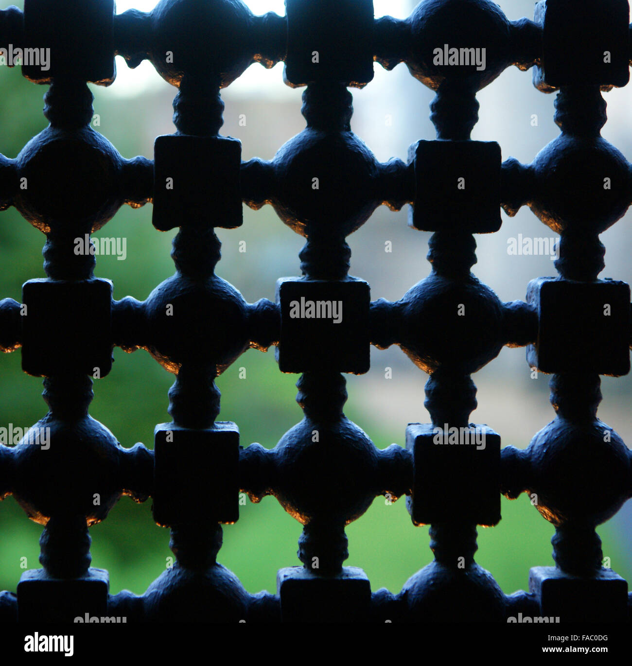 Patterned window grate Stock Photo - Alamy