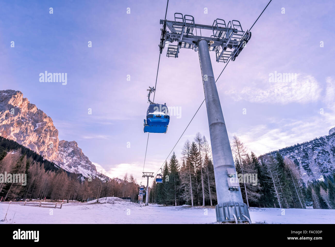 Cable cars running towards the Alps peaks Stock Photo - Alamy