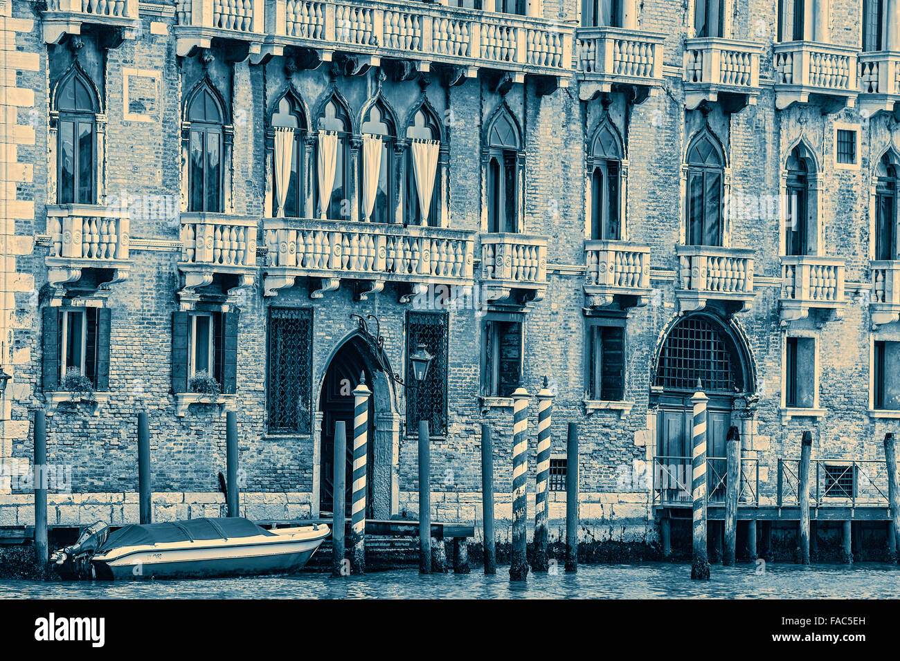 building facade and mooring posts along the Grand Canal, Venice Stock ...
