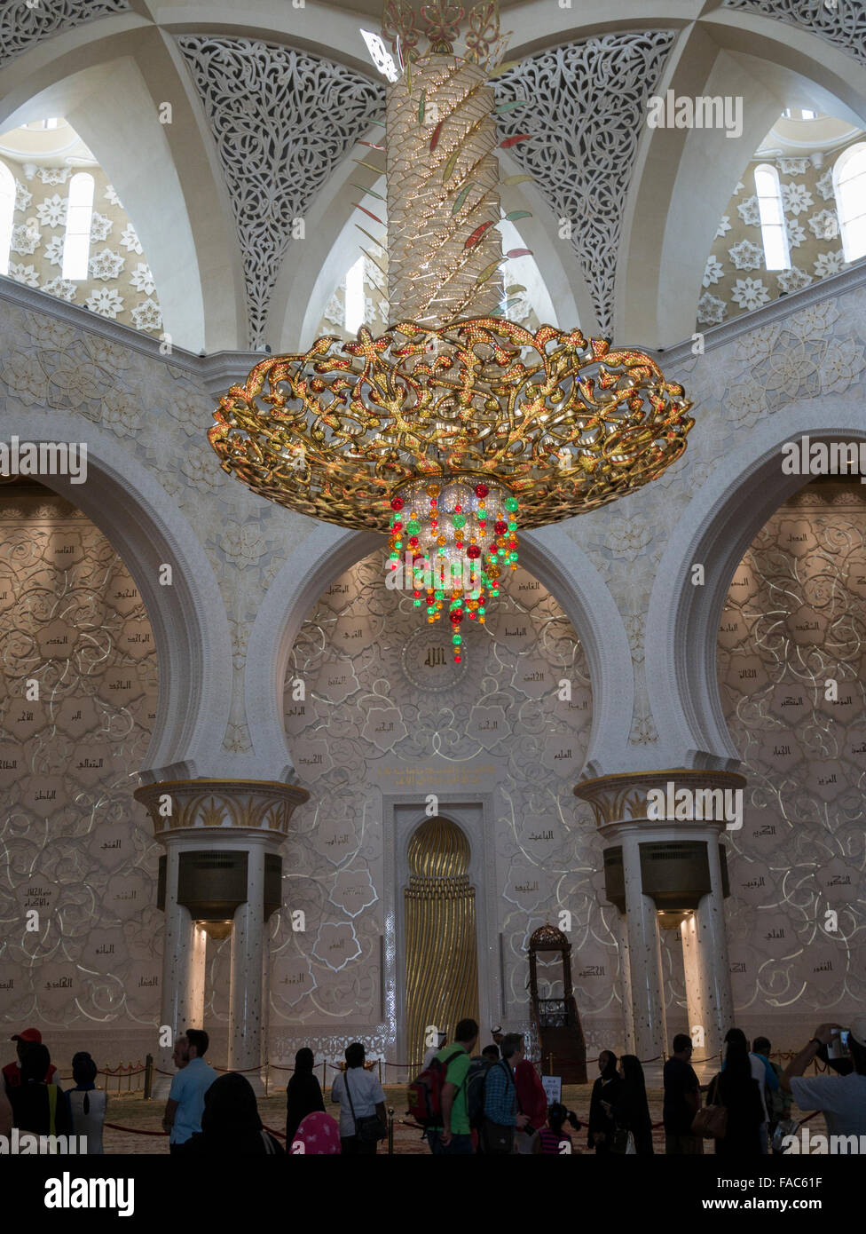 Tourists visiting Sheikh Zayed Grand Mosque located in Abu Dhabi, the ...