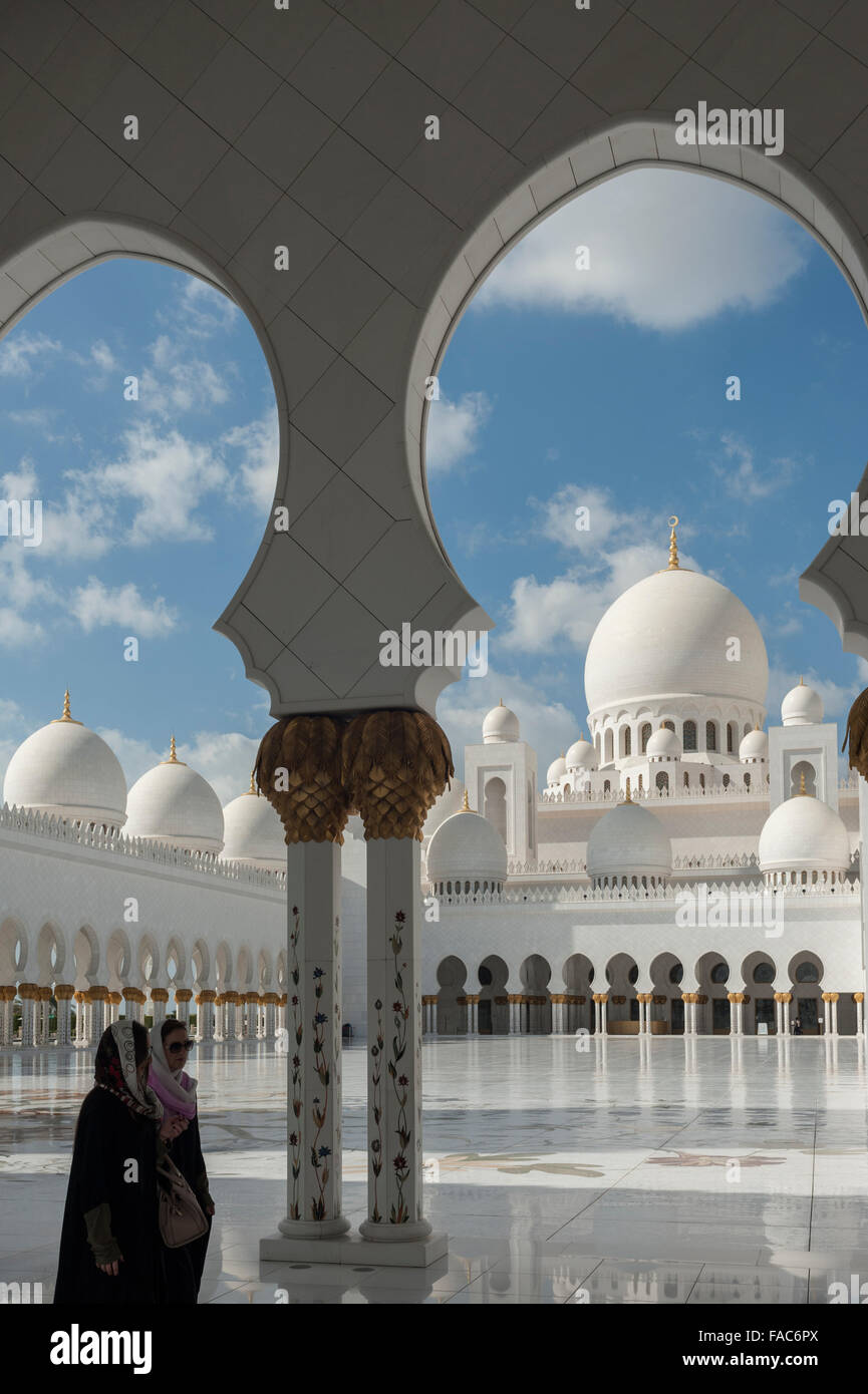 Tourists visiting Sheikh Zayed Grand Mosque located in Abu Dhabi, the ...