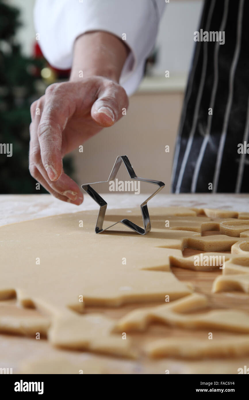 chef is taking a star shape cutter Stock Photo - Alamy