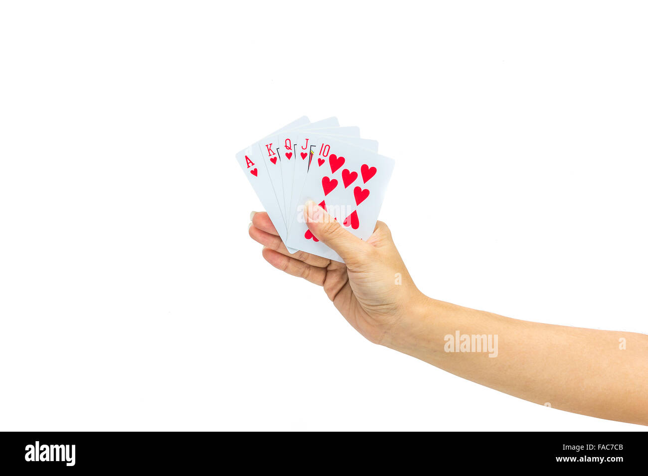 Playing cards in hand isolated on white background Stock Photo - Alamy