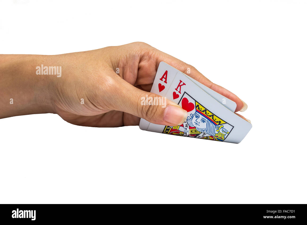 Playing cards in hand isolated on white background Stock Photo - Alamy