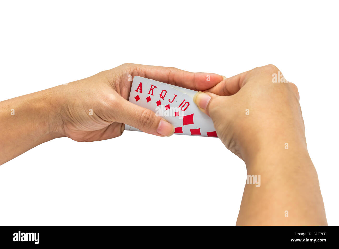 Playing cards in hand isolated on white background Stock Photo - Alamy