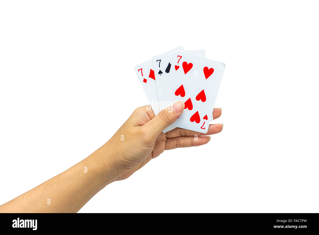 Playing cards in hand isolated on white background Stock Photo - Alamy