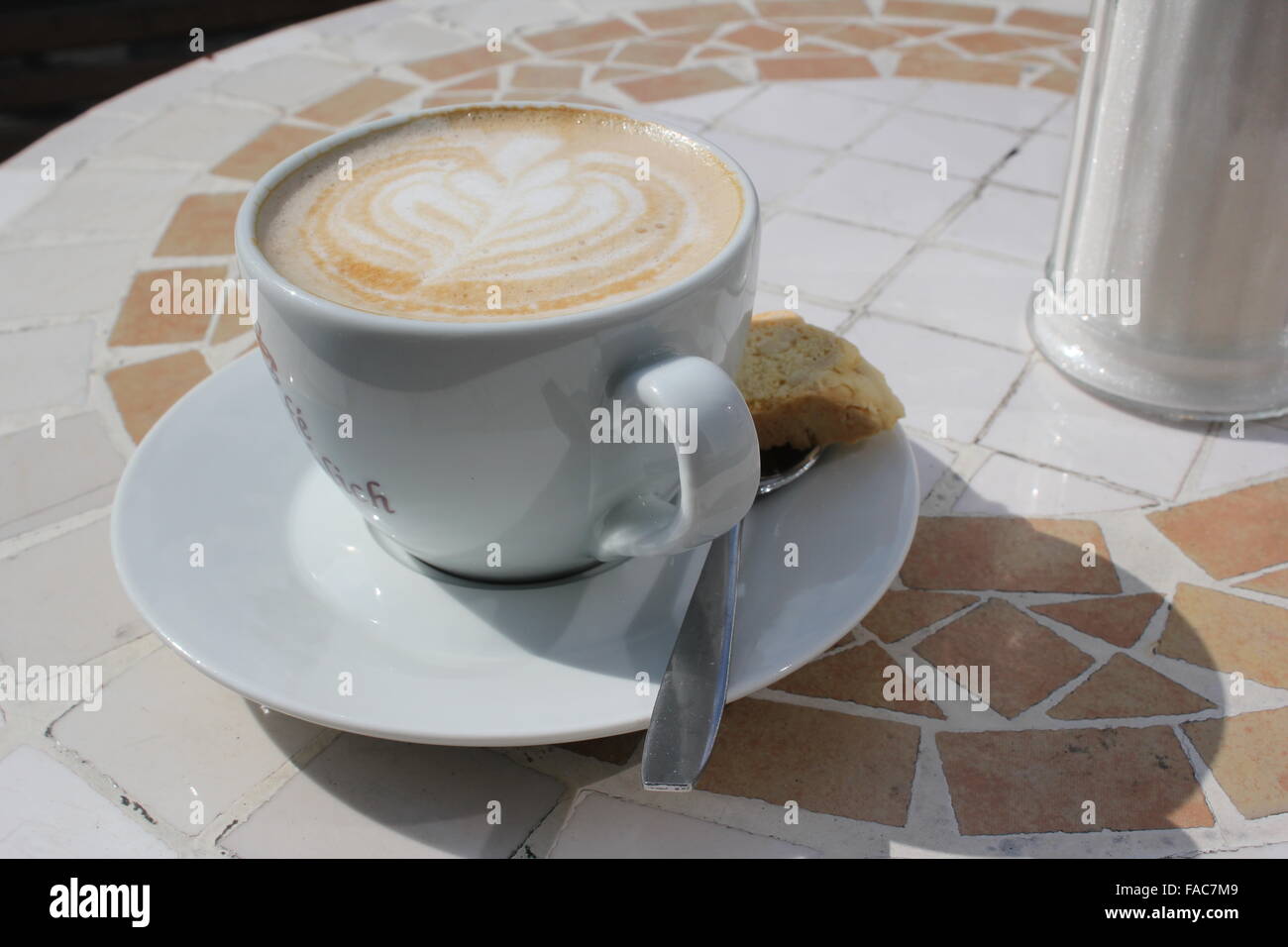 A cup of coffee with milk Stock Photo - Alamy