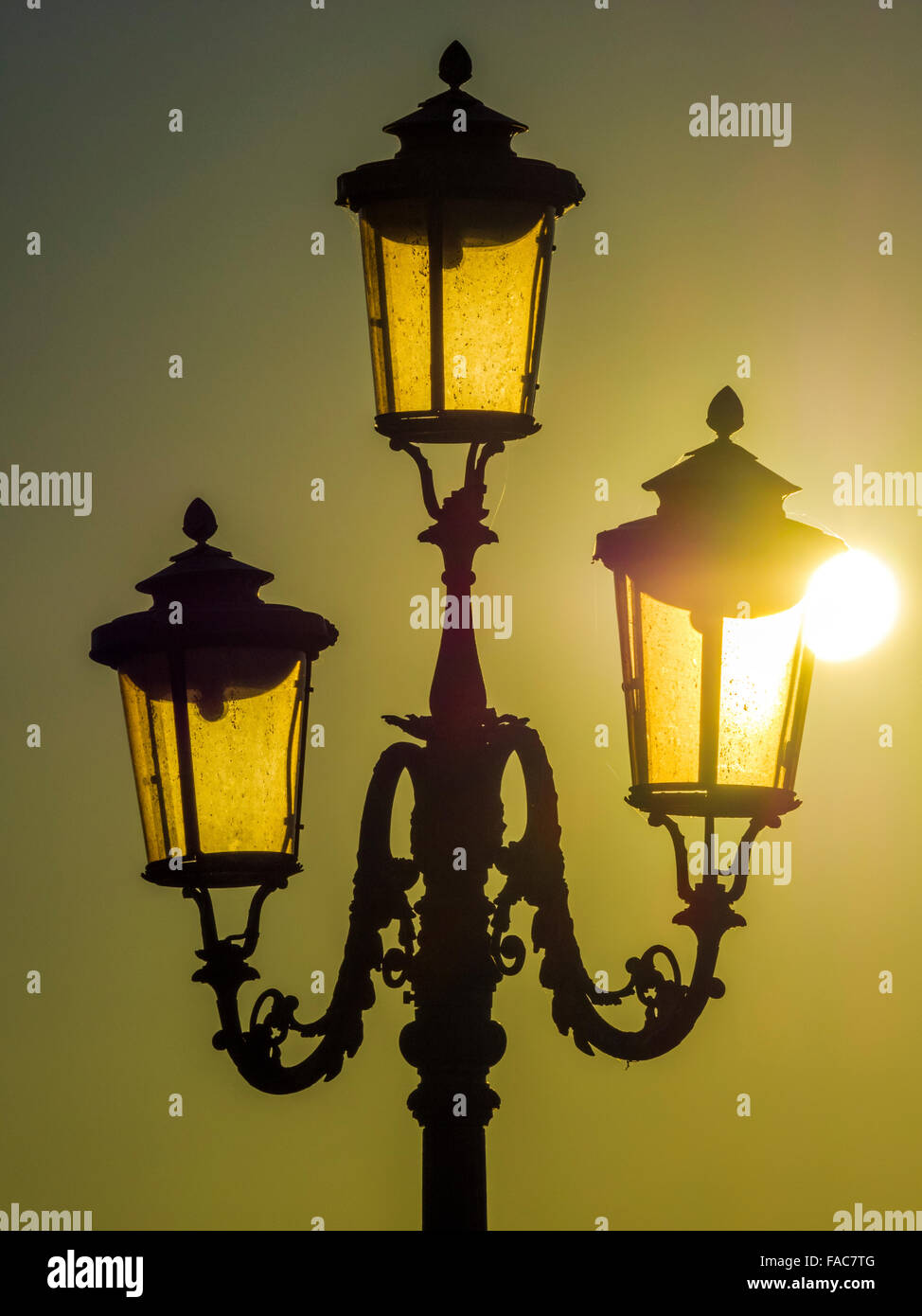 Classic Venitian lamp post in San Marco Square in Venice, Italy Stock ...
