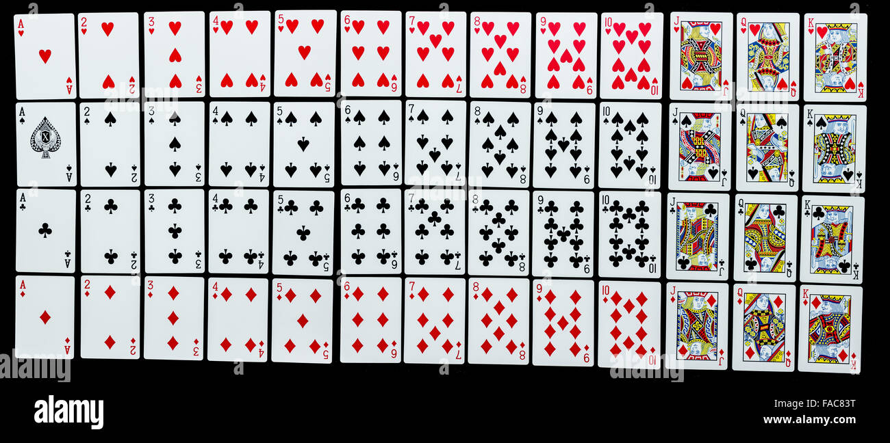 Poker set with isolated cards on black background Stock Photo - Alamy