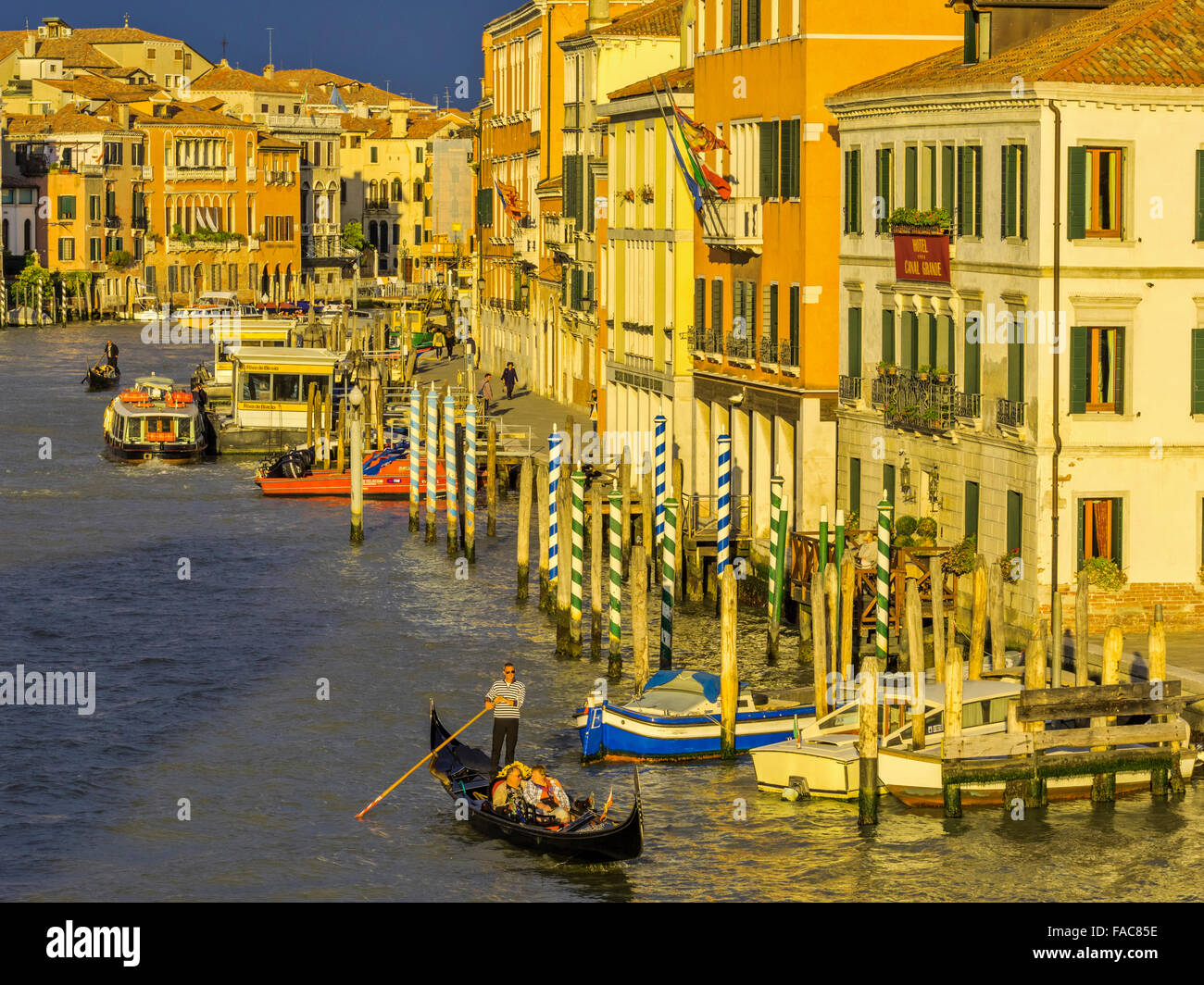Grand canal view from Ponte degli Scalzi bridge at sunset in Venice ...