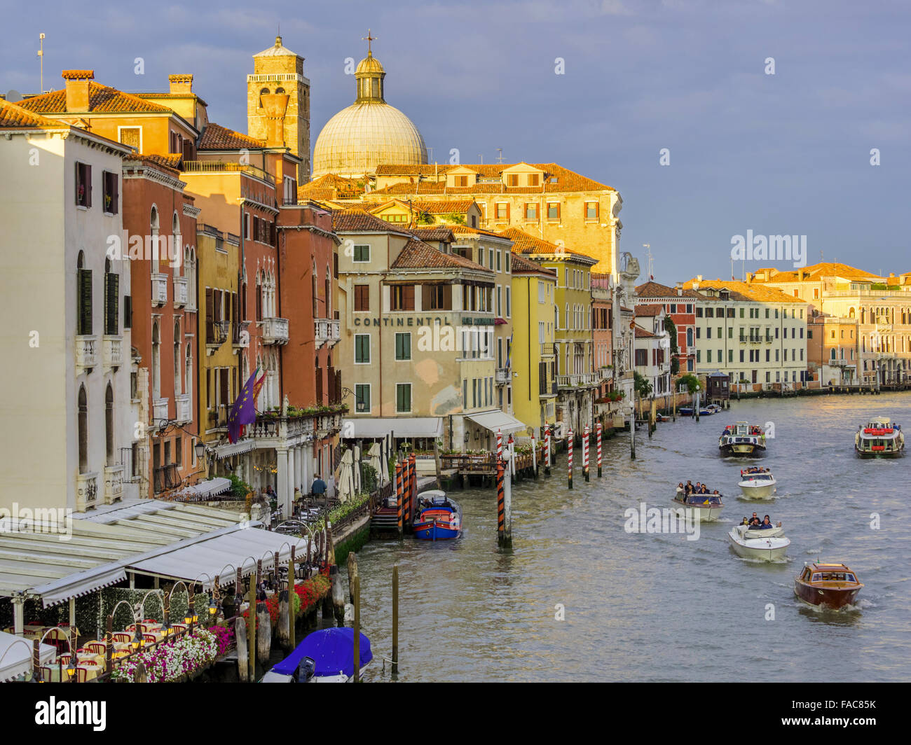Grand canal view from Ponte degli Scalzi bridge at sunset in Venice ...