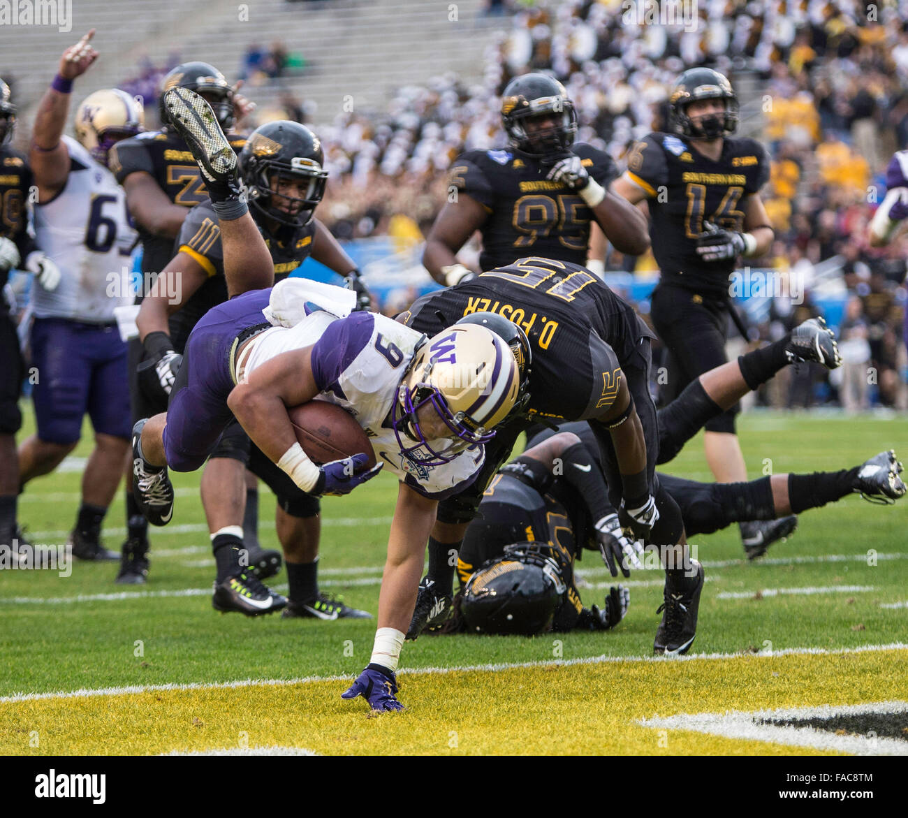 Dallas, Texas, USA. 26th Dec, 2015. Myles Gaskin (9) of the Washington ...