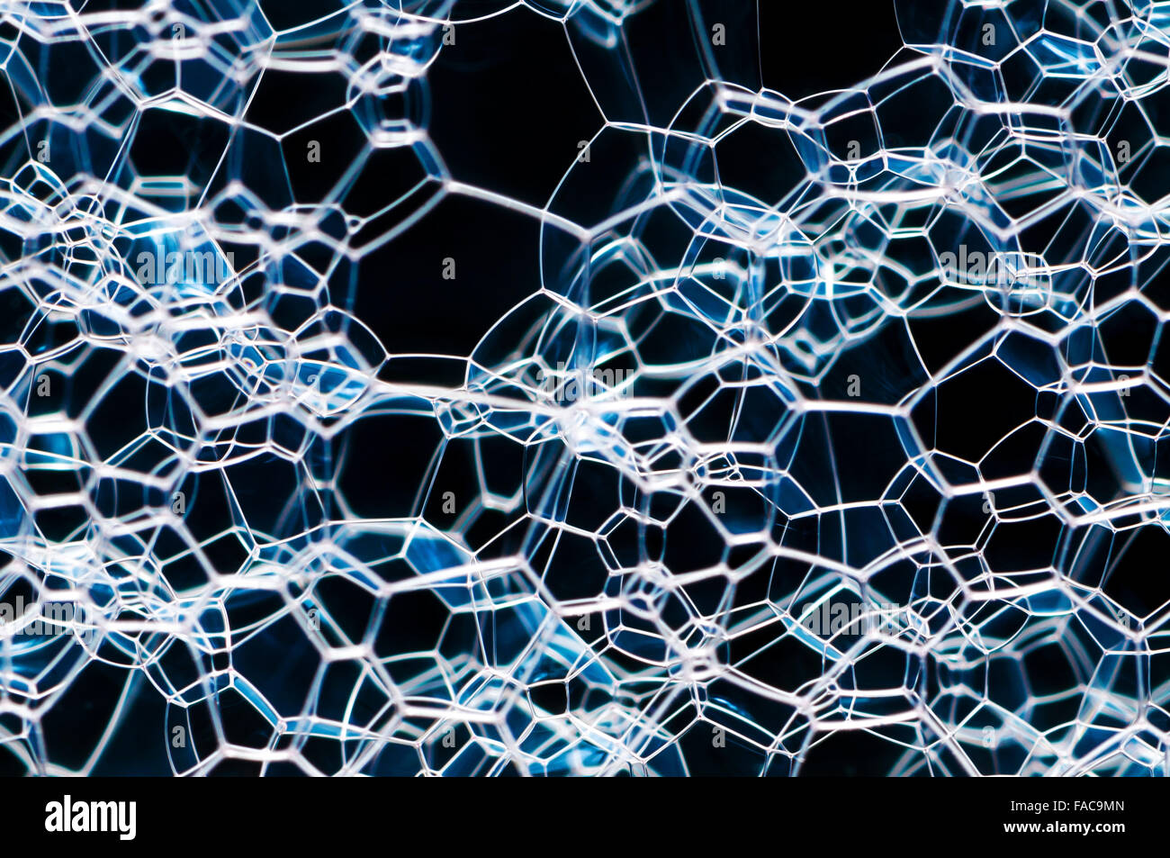 Abstract light pattern with a dark and blue background Stock Photo - Alamy