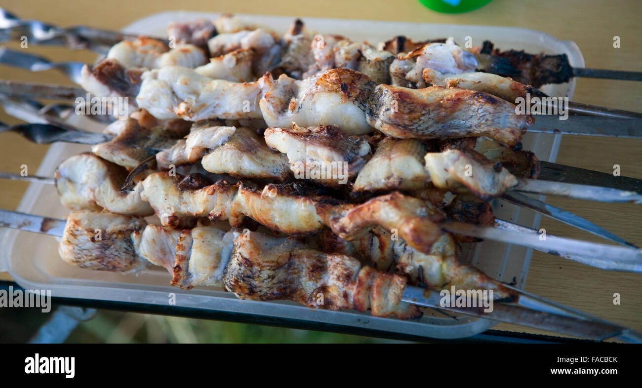 Barbecue of pike cooked directly on fishing Stock Photo - Alamy