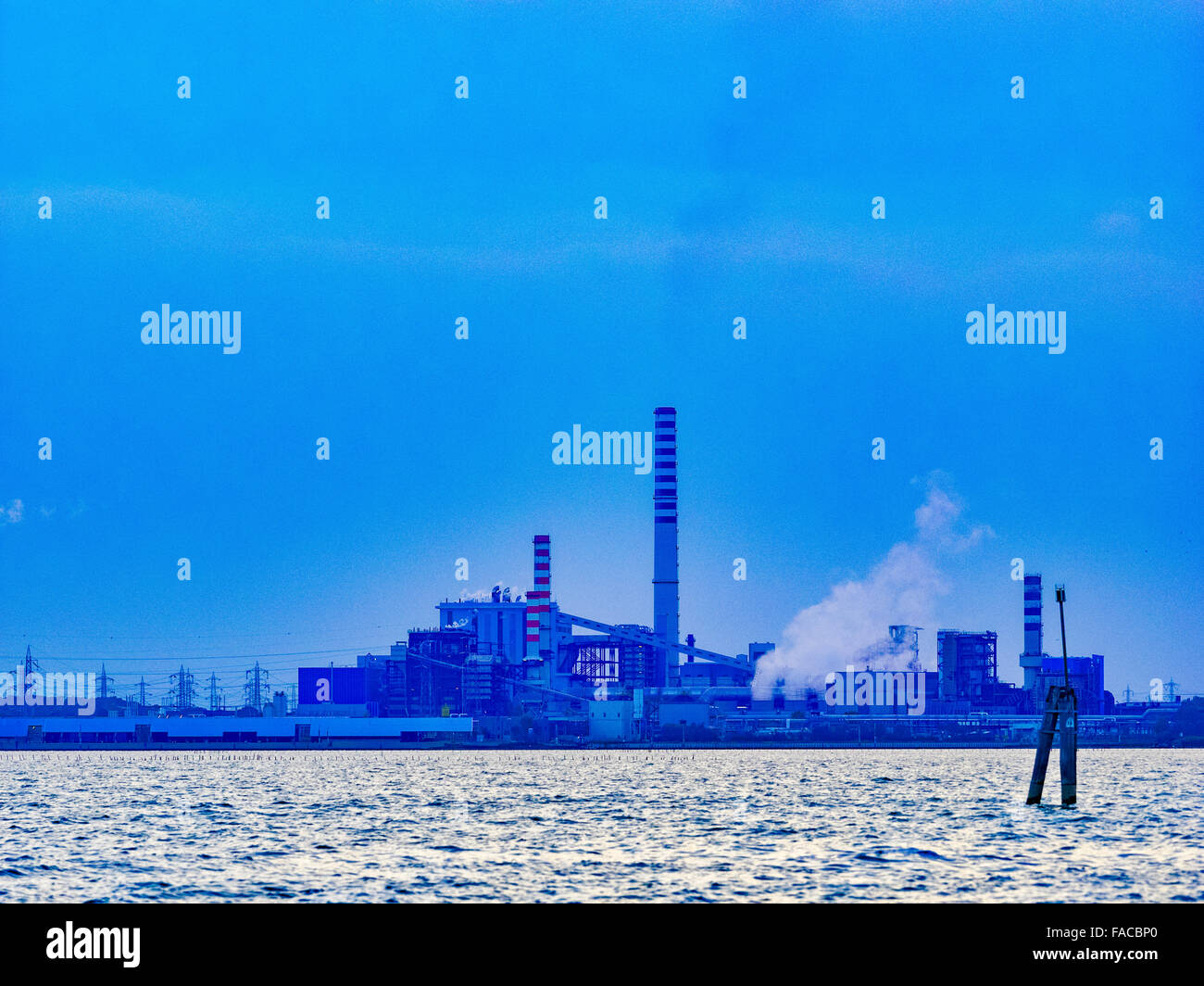 Chemical plant seen from Venice, Italy Stock Photo - Alamy