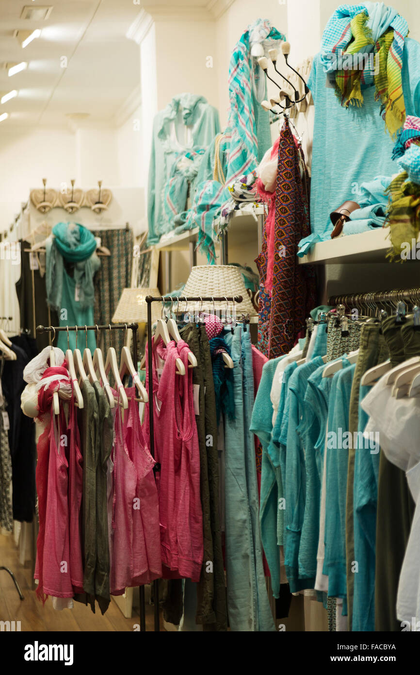 blue dresses for sale in store Stock Photo - Alamy