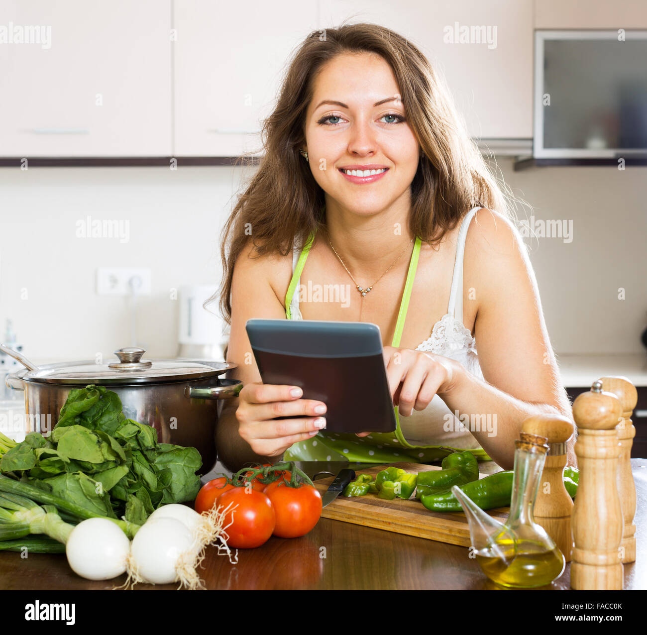 Girl reading from tablet hi-res stock photography and images - Alamy