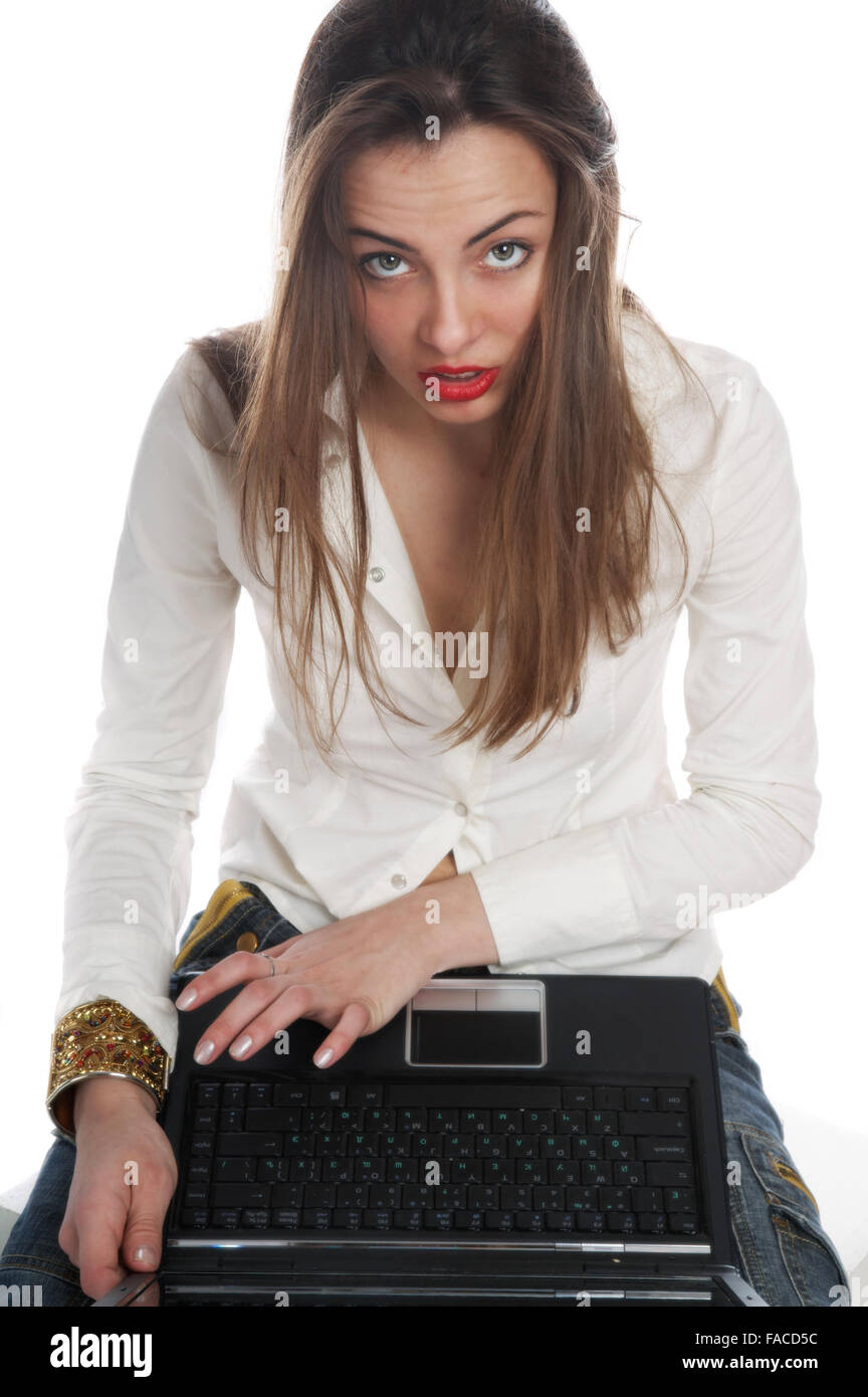 Beautiful girl with a laptop on a white background Stock Photo - Alamy