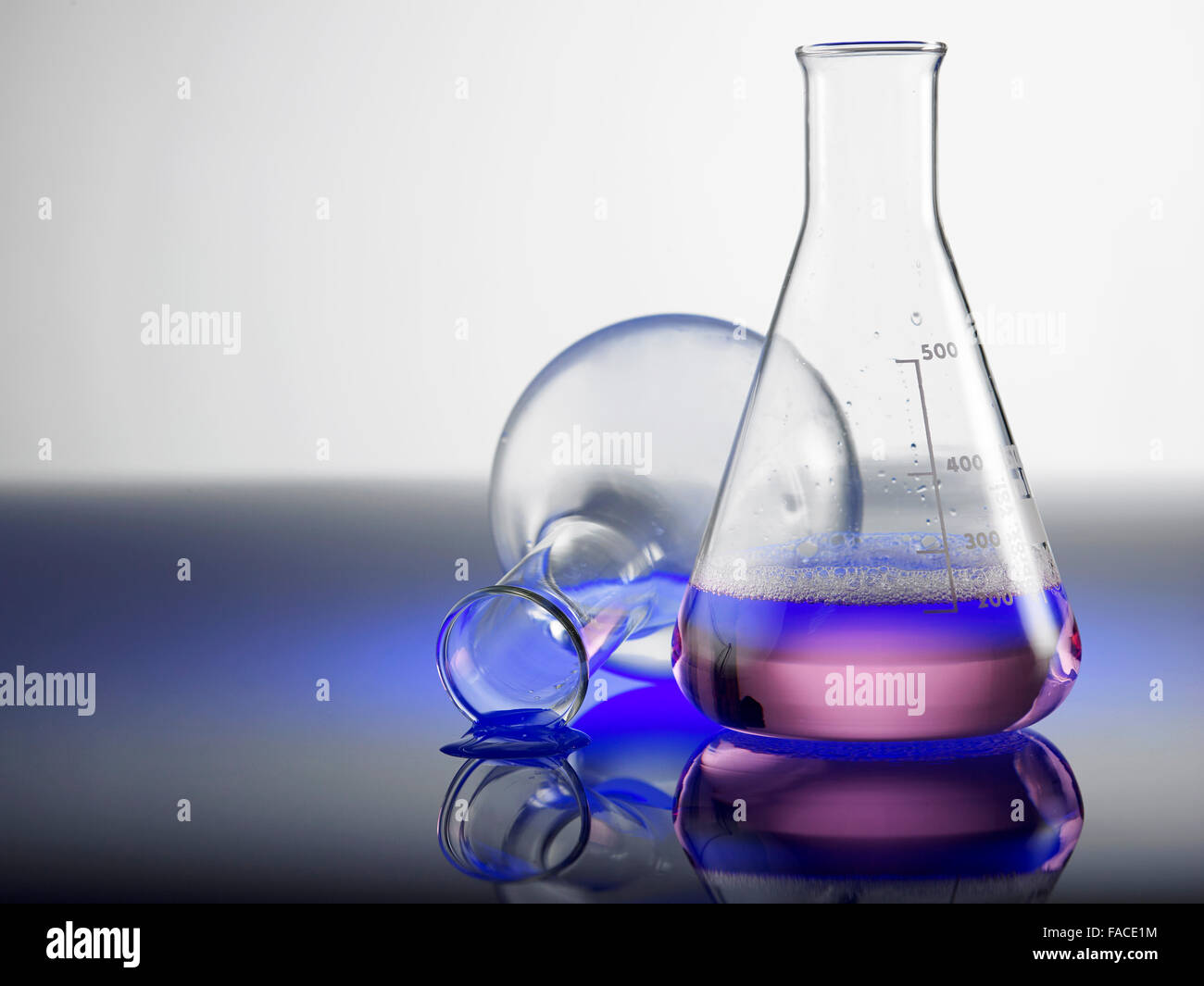 close up Laboratory glassware with liquid Stock Photo - Alamy
