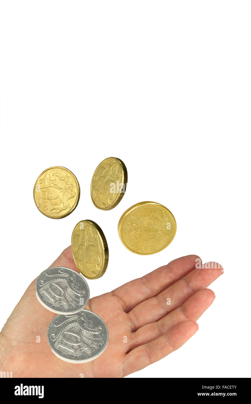 Coins falling hand hi-res stock photography and images - Alamy