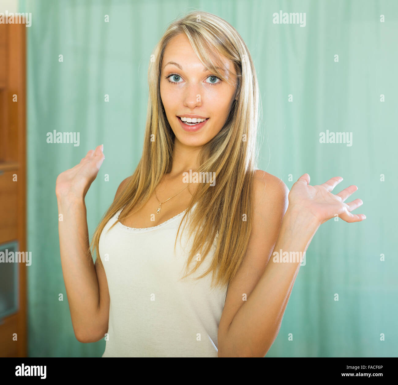 Happy young woman surprised expression close up shoot Stock Photo - Alamy