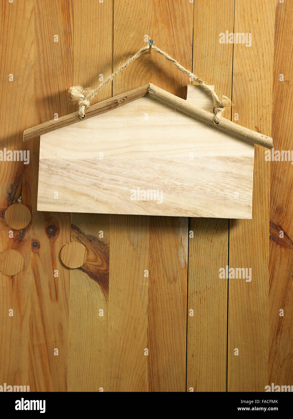 Blank house shape wooden signage Stock Photo - Alamy