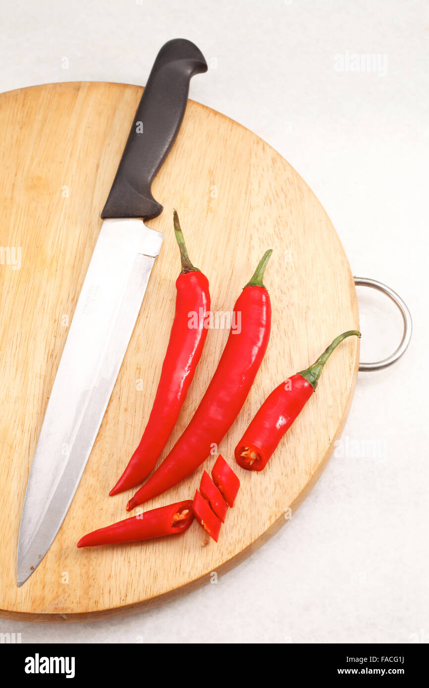 chilli on the chopping board Stock Photo - Alamy