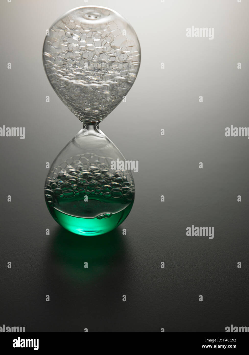 Close up of the water hour glass Stock Photo - Alamy