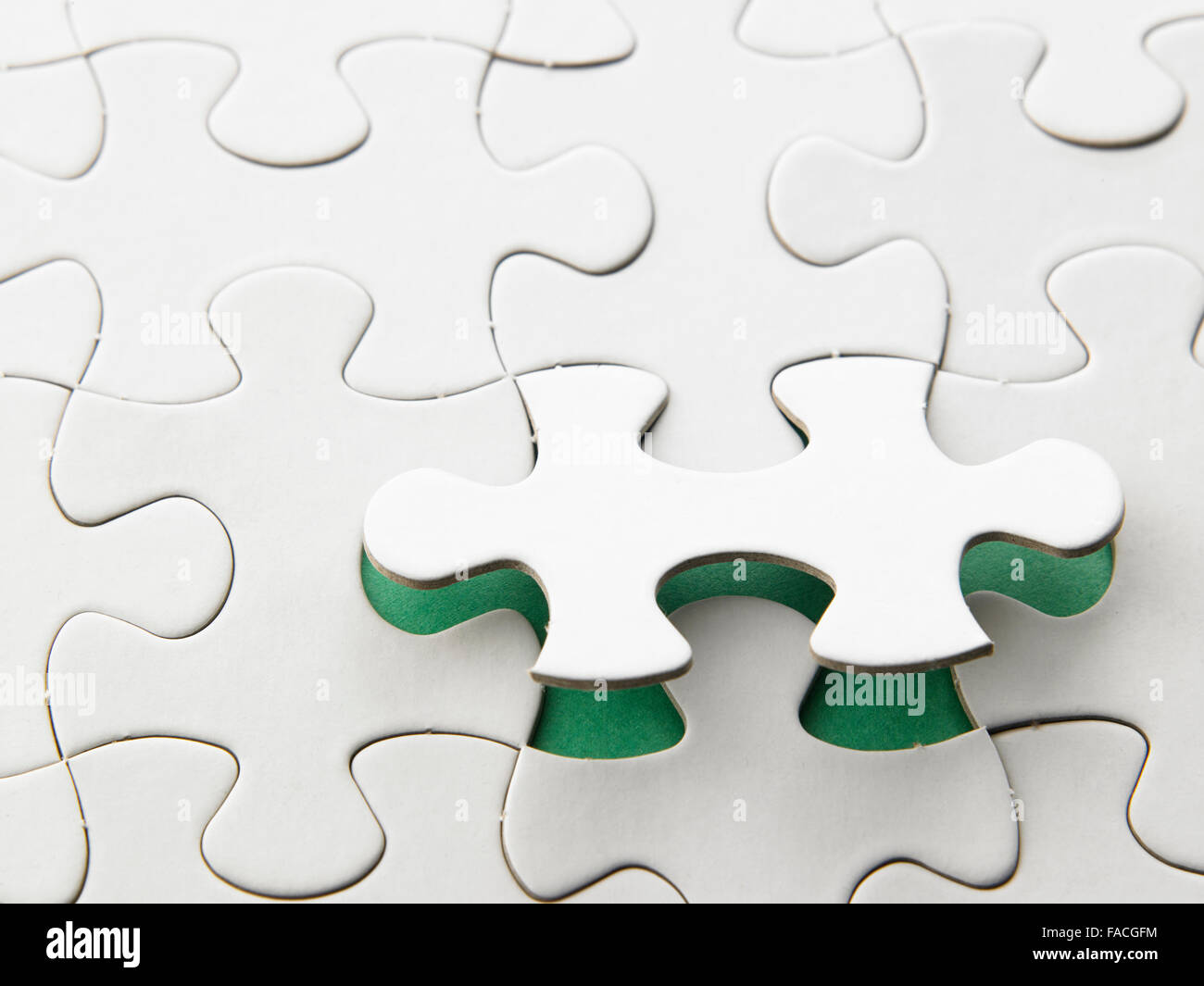 The last piece of a jigsaw puzzle Stock Photo - Alamy