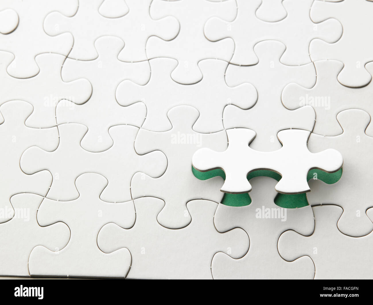 The last piece of a jigsaw puzzle Stock Photo - Alamy