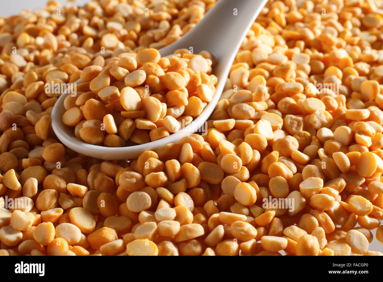 A spoon od of asian food dahl Stock Photo - Alamy