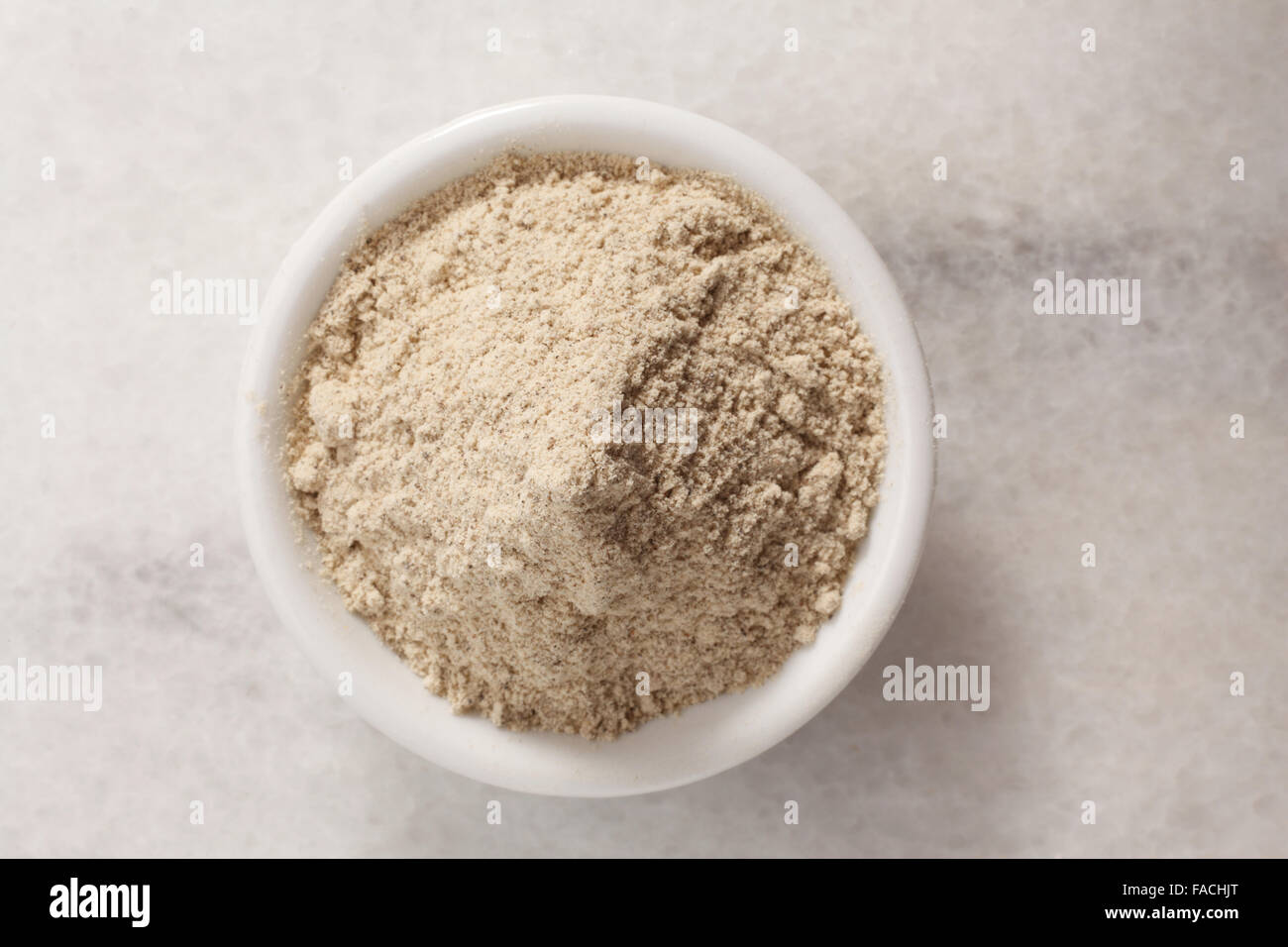 Close up white pepper powder Stock Photo - Alamy