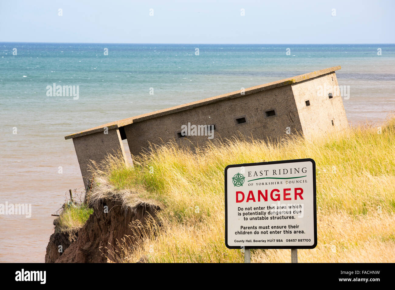 A Second world War lookout post leaning alarmingly and about to tumble ...