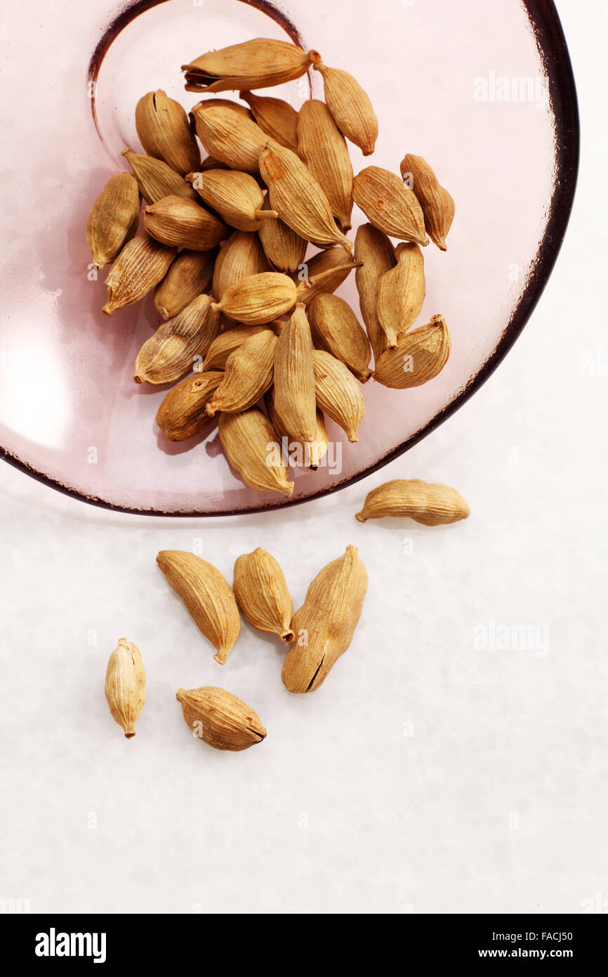 indian spices,cardamon in a bowl Stock Photo - Alamy