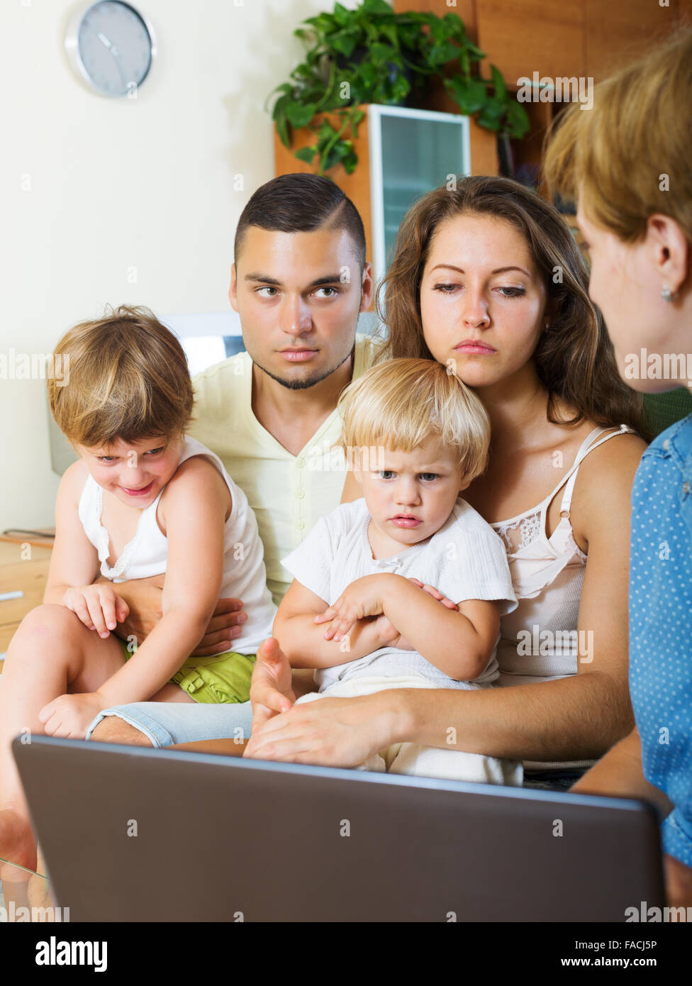 serious parents with little kids participating in door-to-door poll ...