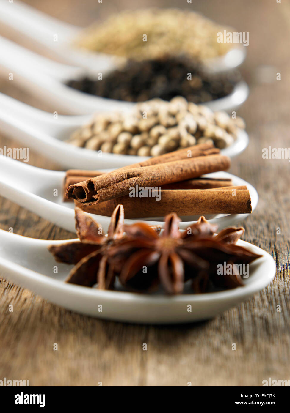 few spices focus on the cinnamon Stock Photo - Alamy