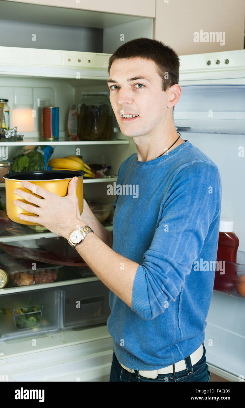 Man look into freezer hi-res stock photography and images - Alamy
