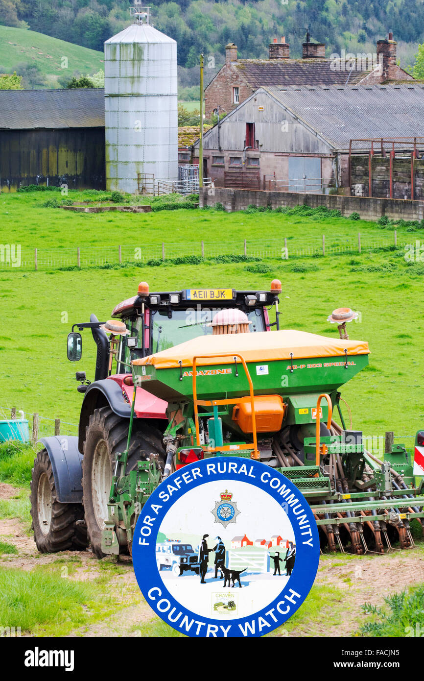 A seed drilling rig on the back of a tractor at a farm in Kirkoswold in ...