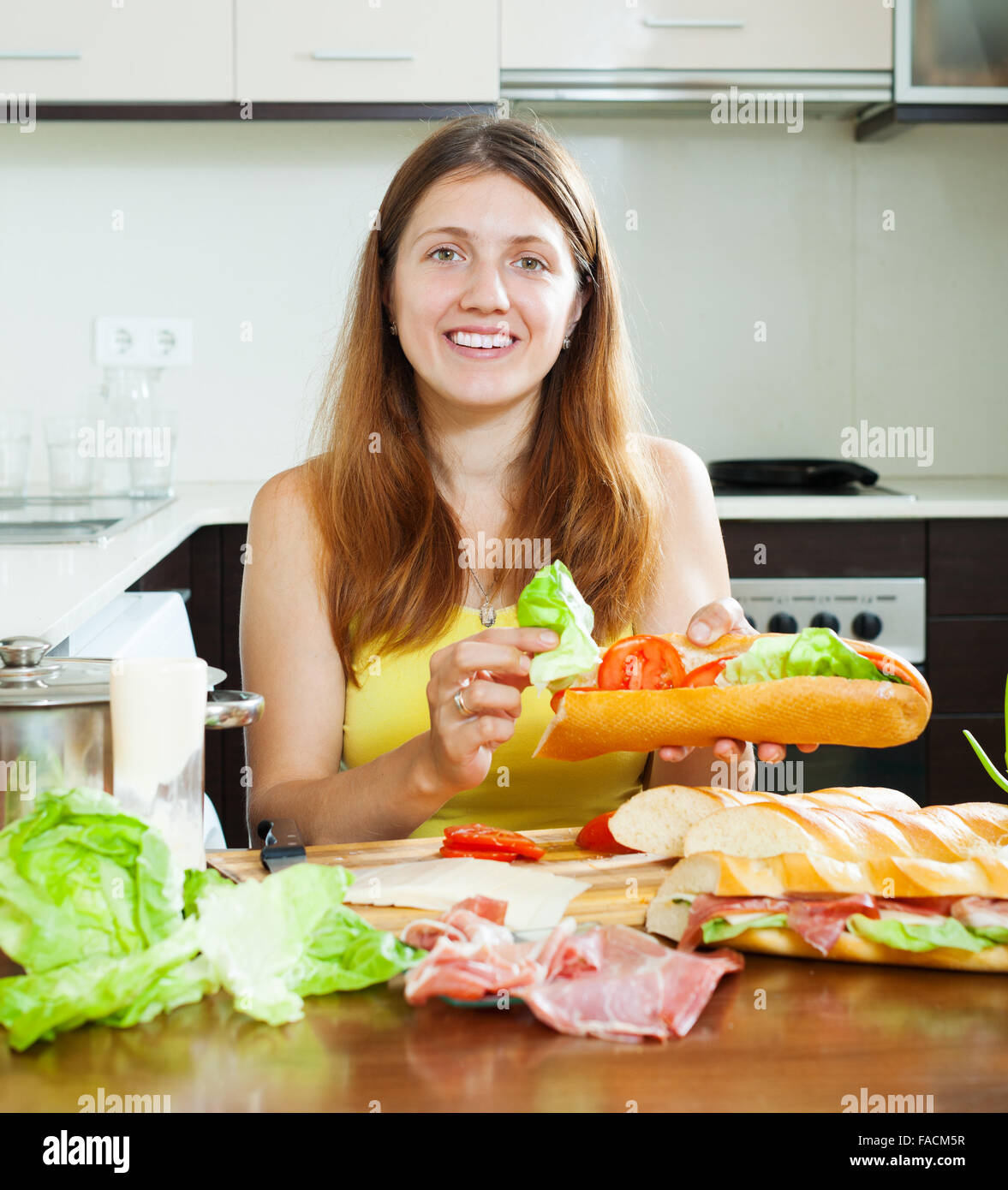 woman cooking spanish sandwiches in home kitchen Stock Photo - Alamy
