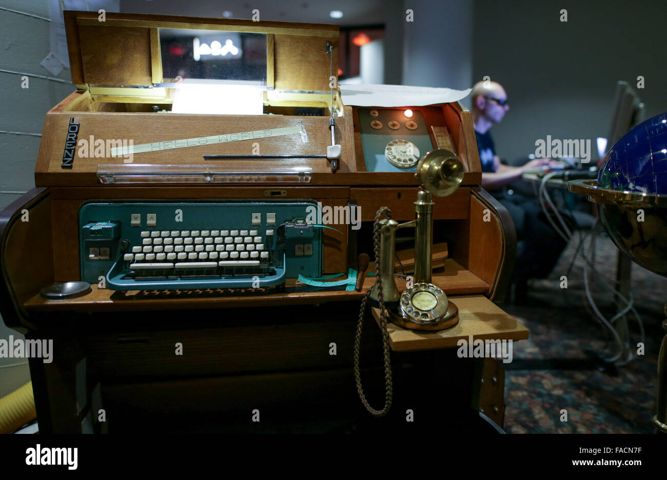 Attendees to the congress of the Chaos Computer Club (CCC) show an old ...