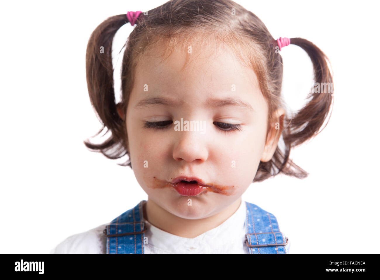 Girl eating chocolate hi-res stock photography and images - Alamy