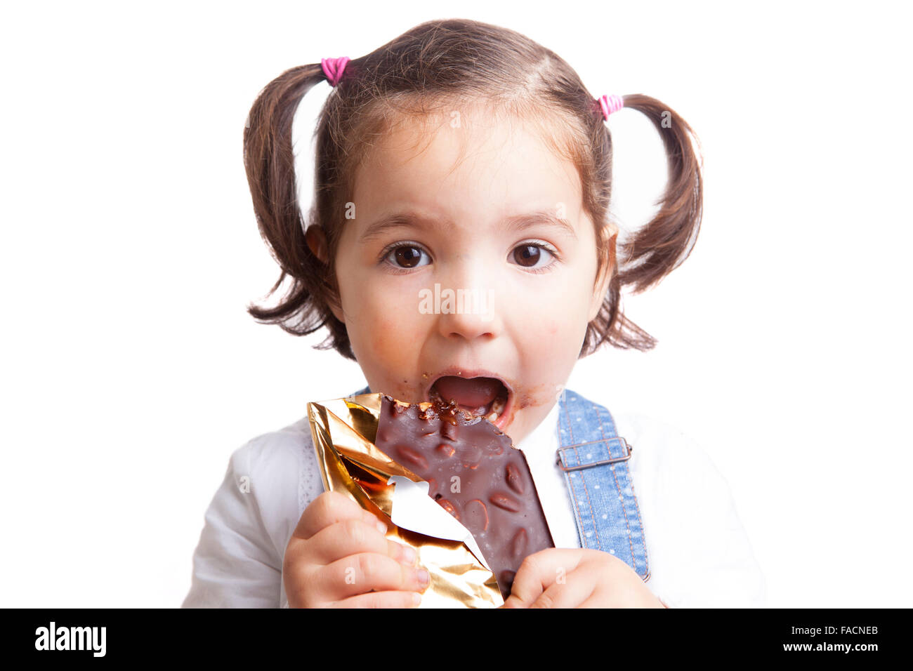 Happy girl eating hi-res stock photography and images - Alamy