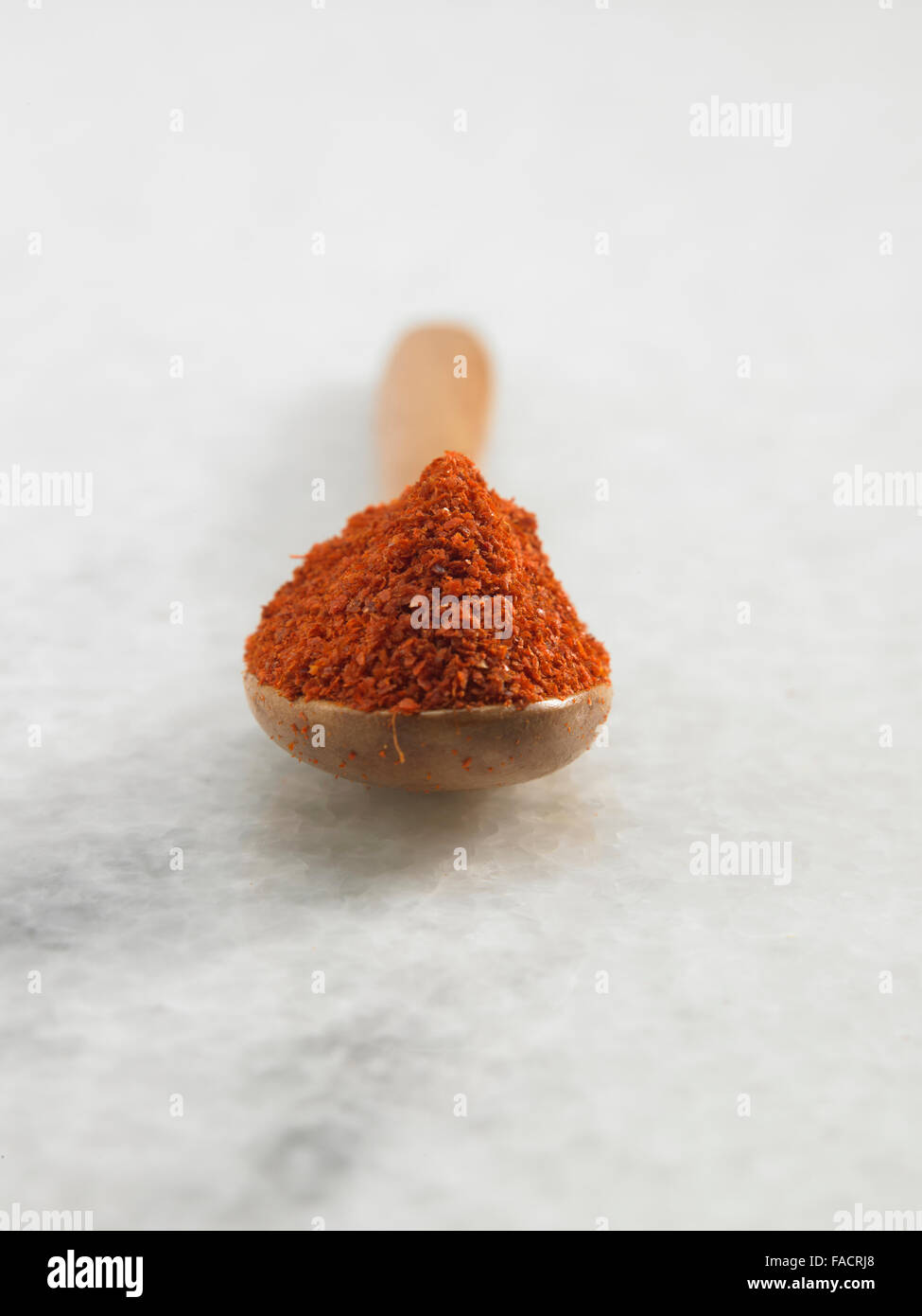 spoon full of the chilli powder Stock Photo - Alamy